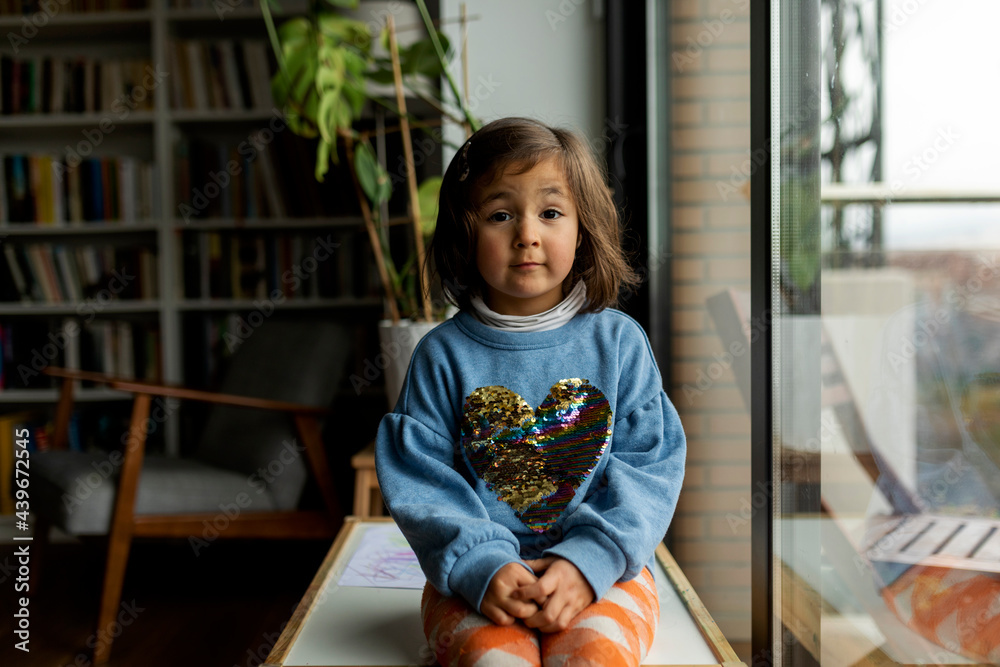 little girl making funny and silly faces Stock Photo | Adobe Stock