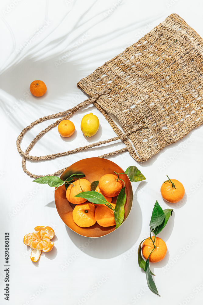Still life of handwoven tote bag with citrus fruit Stock Photo | Adobe ...
