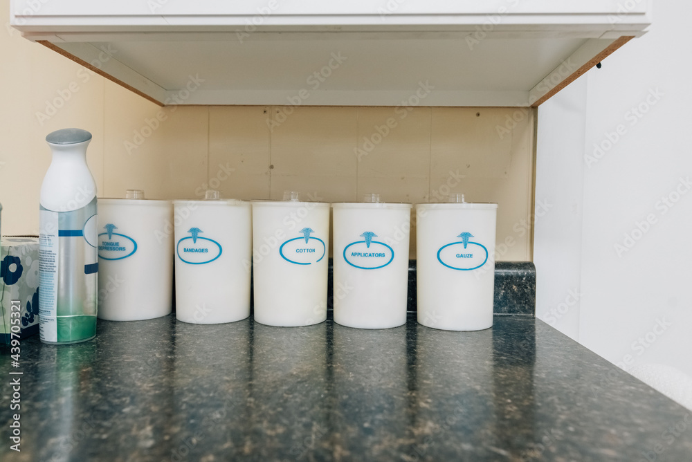 Health care containers on a counter. Stock Photo | Adobe Stock