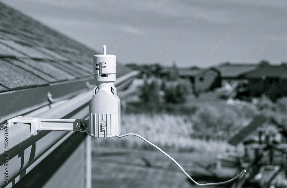Wireless sprinkler rain sensor used to conserve water. Device is ...