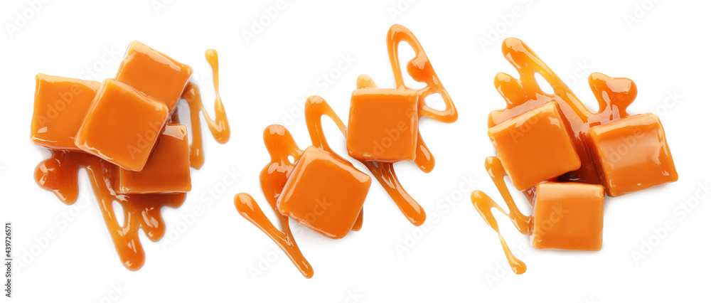 Set of delicious caramel candies with sauce on white background, top ...
