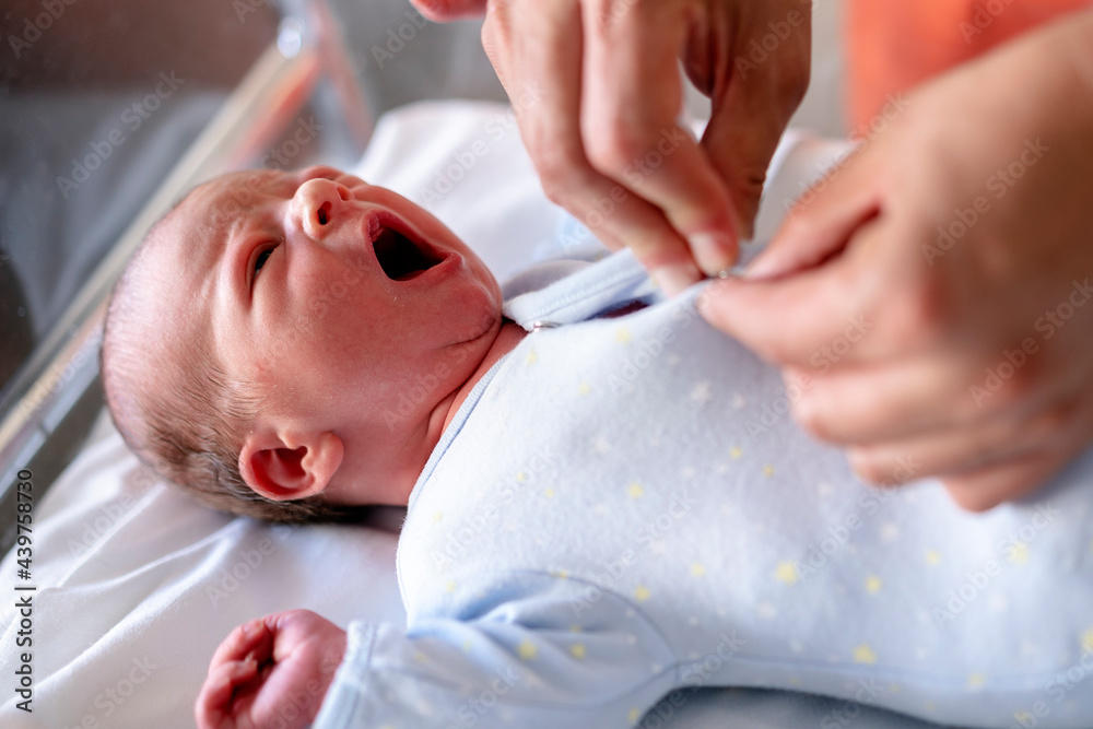 newborn baby yawning Stock Photo | Adobe Stock