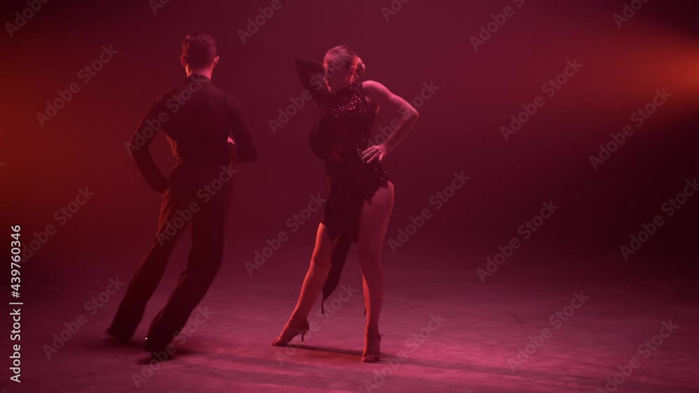 Ballroom couple dancing cha cha cha indoors. Dance couple performing ...