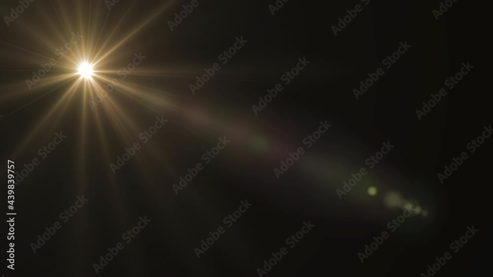 Optical Lens flare effect, 4K yellow on black background. Top left ...