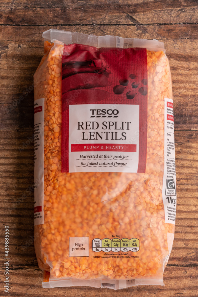Tesco branded red split lentils displaying symbols with Kcal values and ...