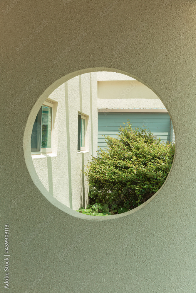 Wall with circular holes Stock Photo | Adobe Stock