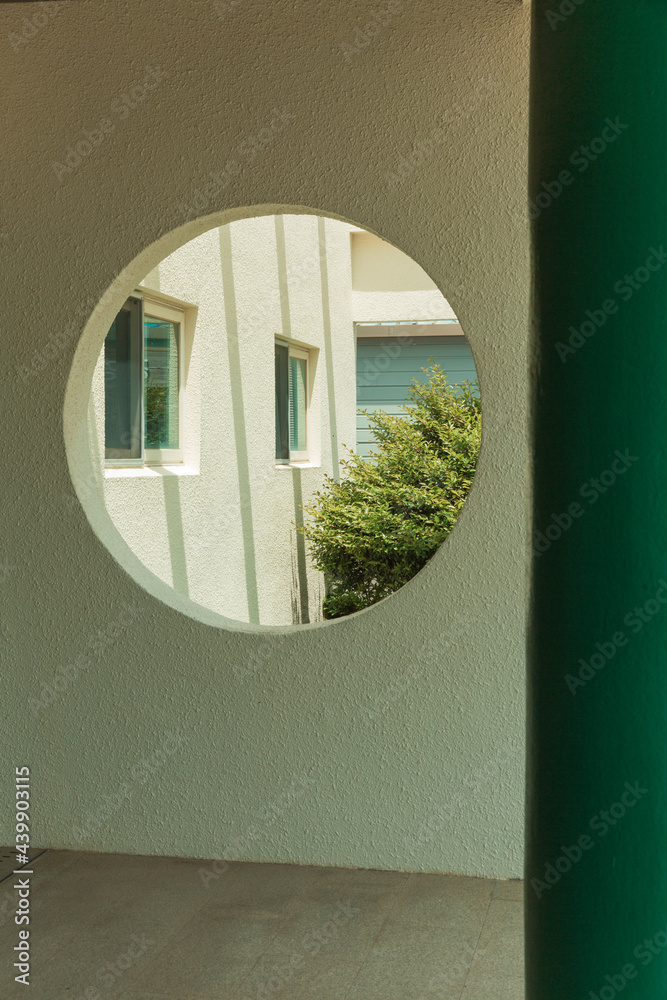 Wall with circular holes Stock Photo | Adobe Stock