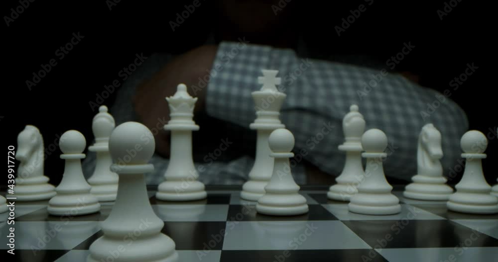 Filmed in a dark key. White moves with a pawn. Super-macro photography ...