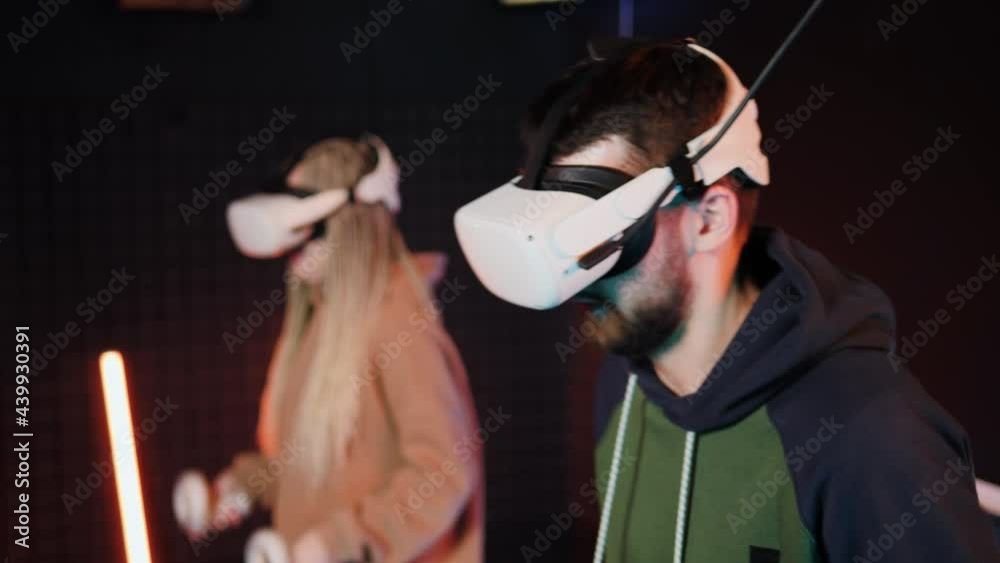 Oculus Rift VR drumming. People in gaming headsets play virtual reality ...