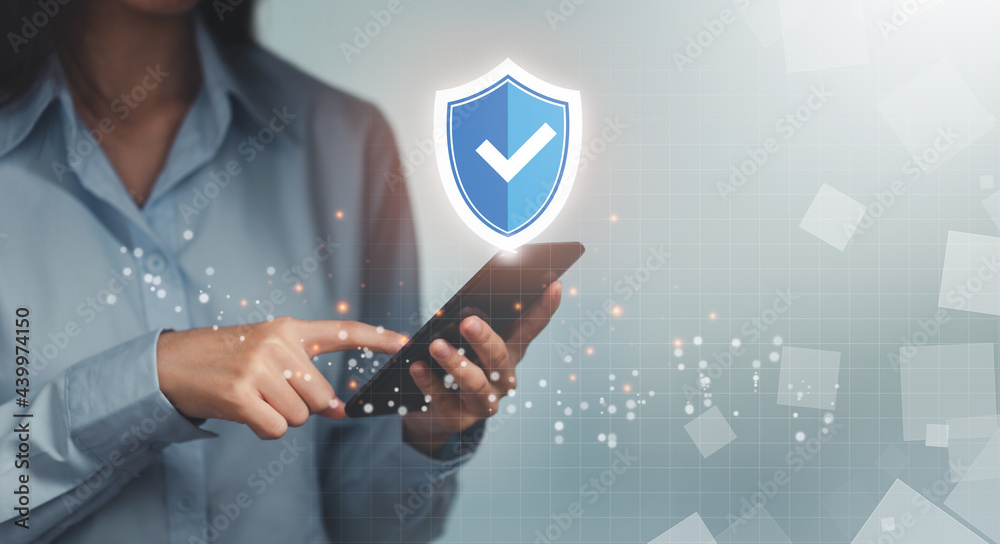 Woman hand enter a one time password for the validation process on ...