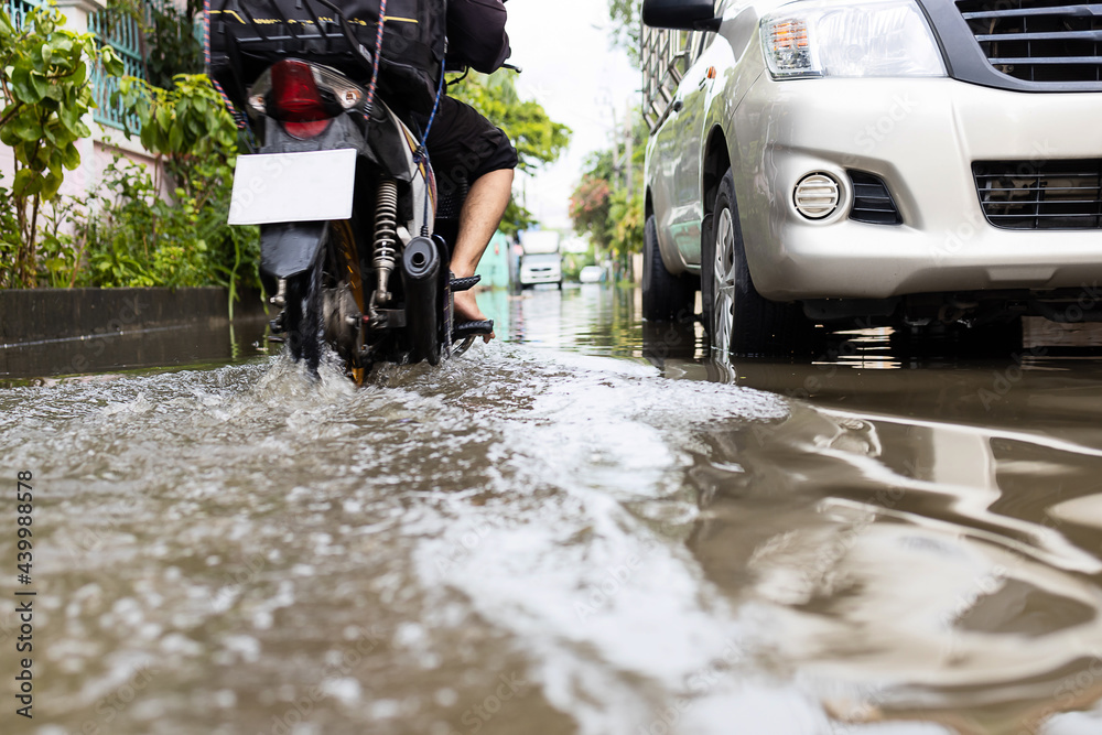Flooded car vehicles after heavy rain,street in the alley were covered ...