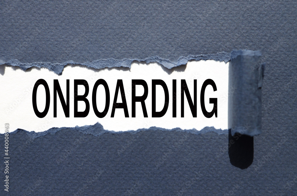 Onboarding. text on torn cardboard. black letters on white paper Stock ...
