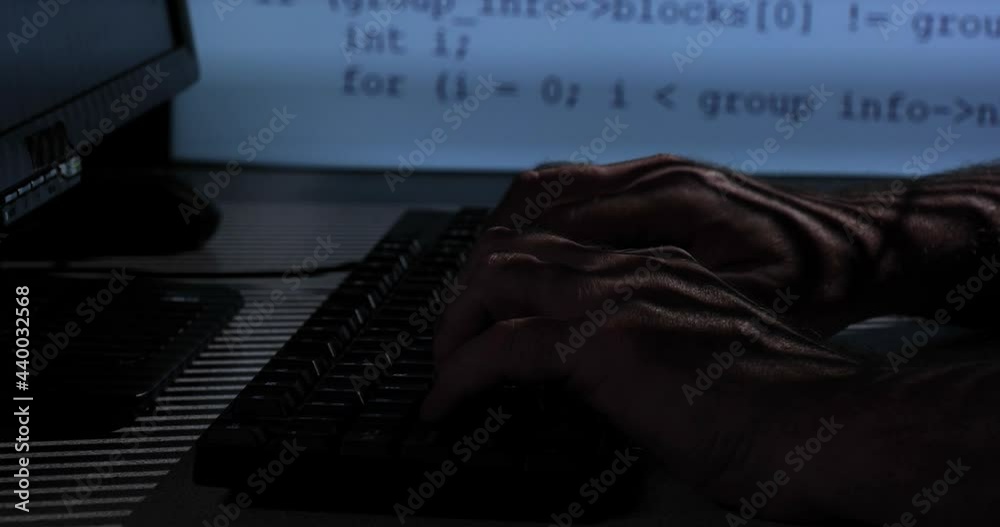 Hacker Or Coder Types Code On A Computer Keyboard In A Close Up Stock ビデオ Adobe Stock