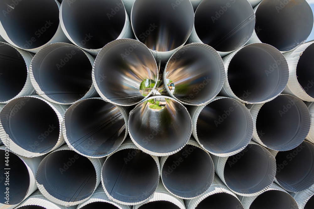 Downpipe warehouse. Steel pipes, parts for the construction of a roof ...