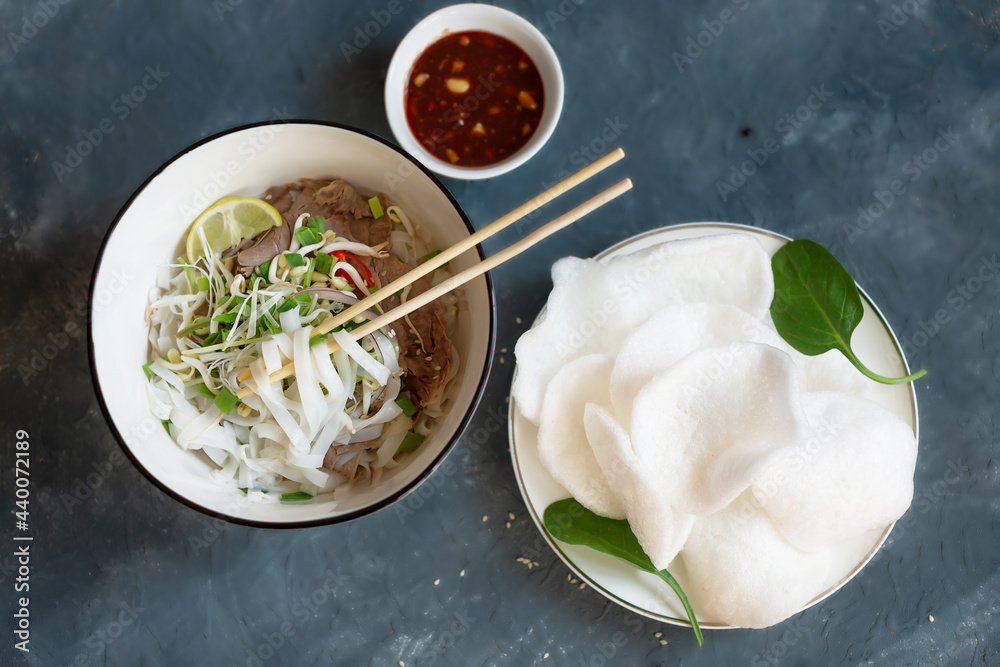 Pho bo, a traditional Vietnamese noodle and beef soup and a traditional ...