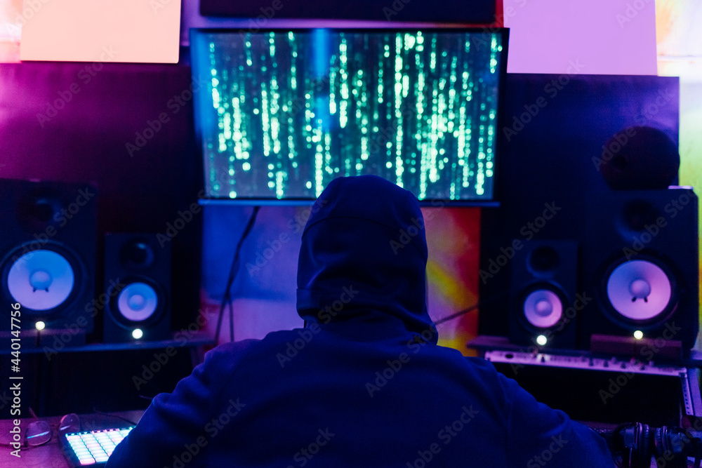 Man hacking computer data at home Stock Photo | Adobe Stock
