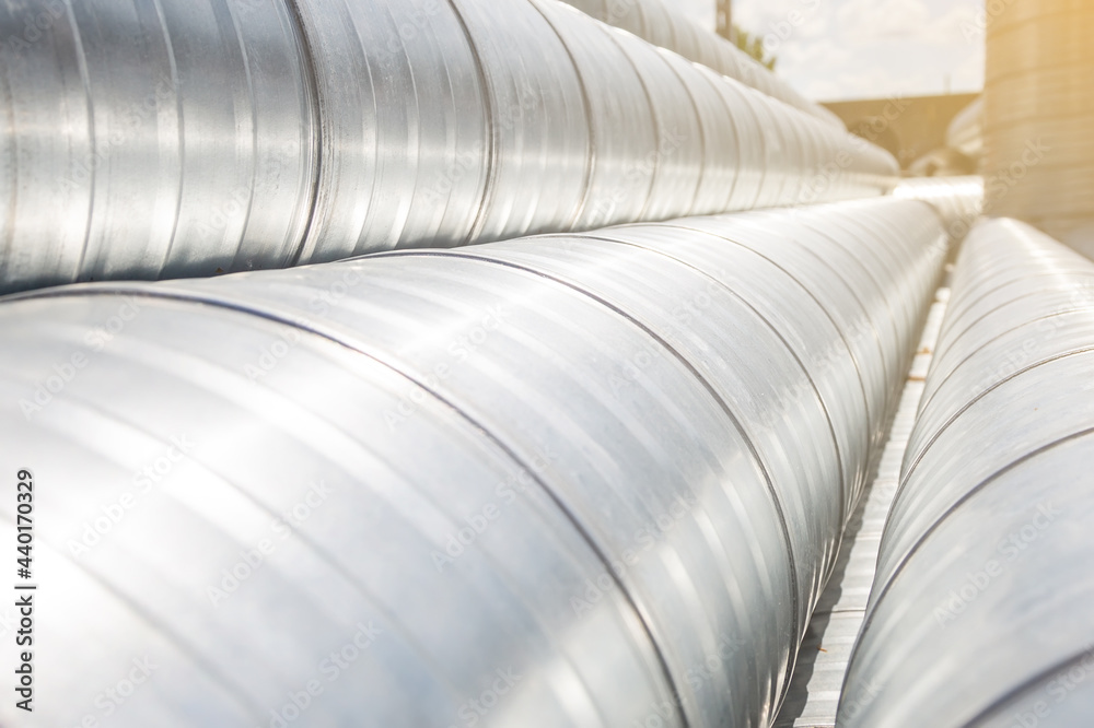 Ventilation pipe warehouse. Steel pipes, parts for the construction of ...