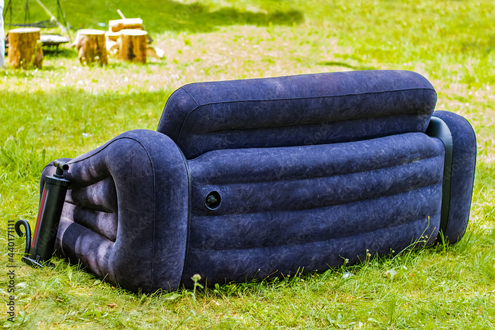 Inflatable sofa for outdoor recreation. Summer backyard party. Stock ...