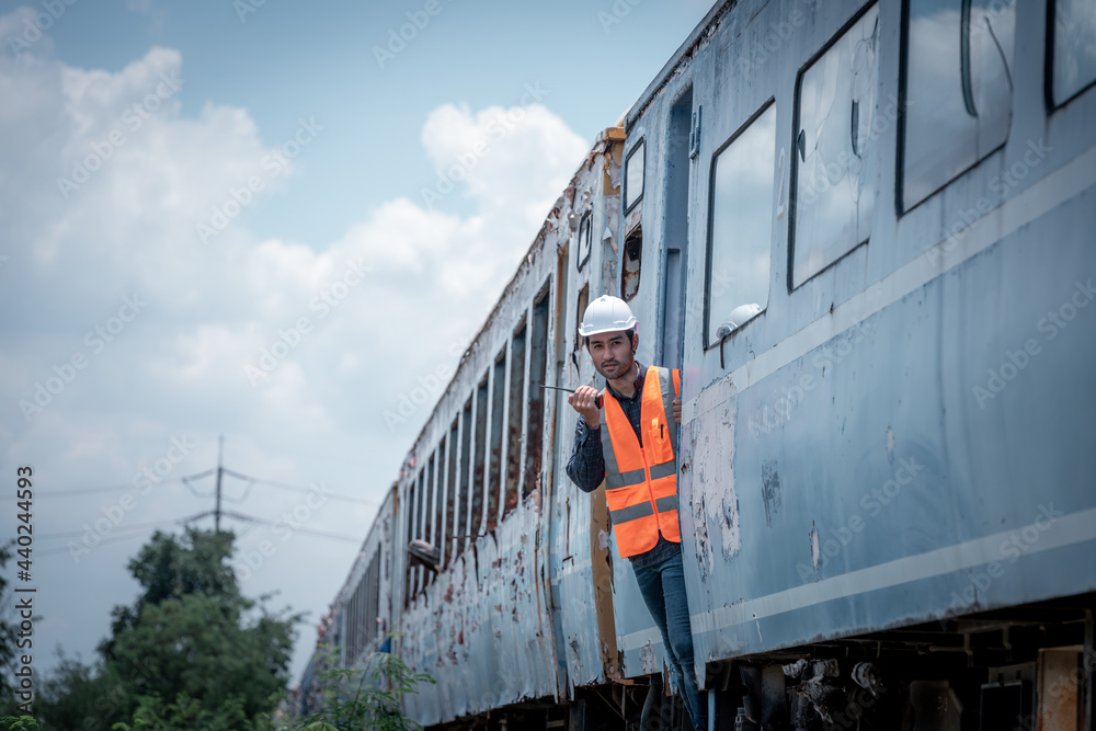 Engineer under inspection and checking construction process railway ...