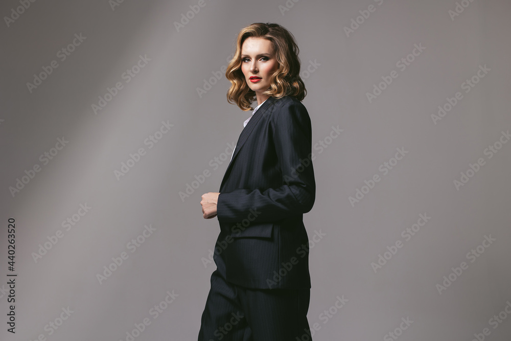 Stylish business successful confident woman in black work suit ...