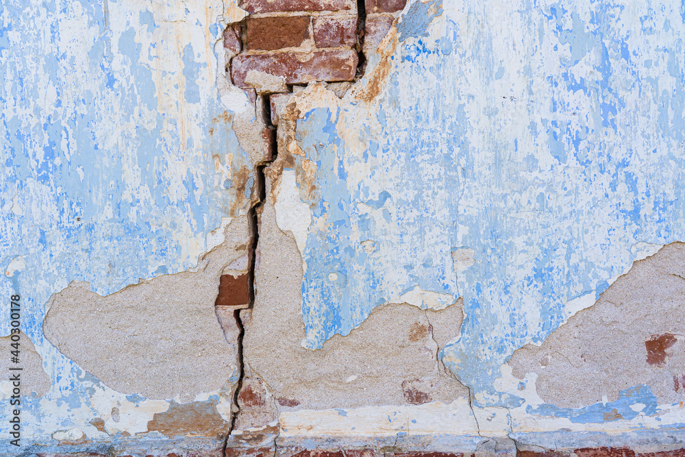 Fragment Of The Wall Of An Old Brick House There Is A Large Crack