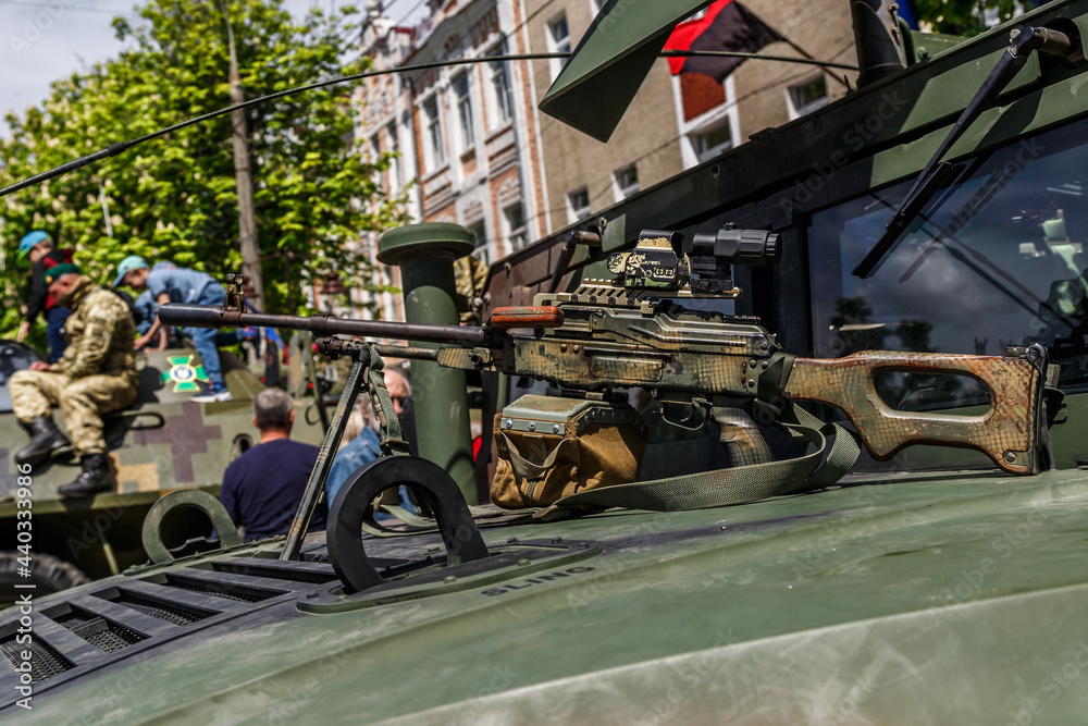 Machine gun Kalashnikov on the tripod and optical sight.M249 light ...