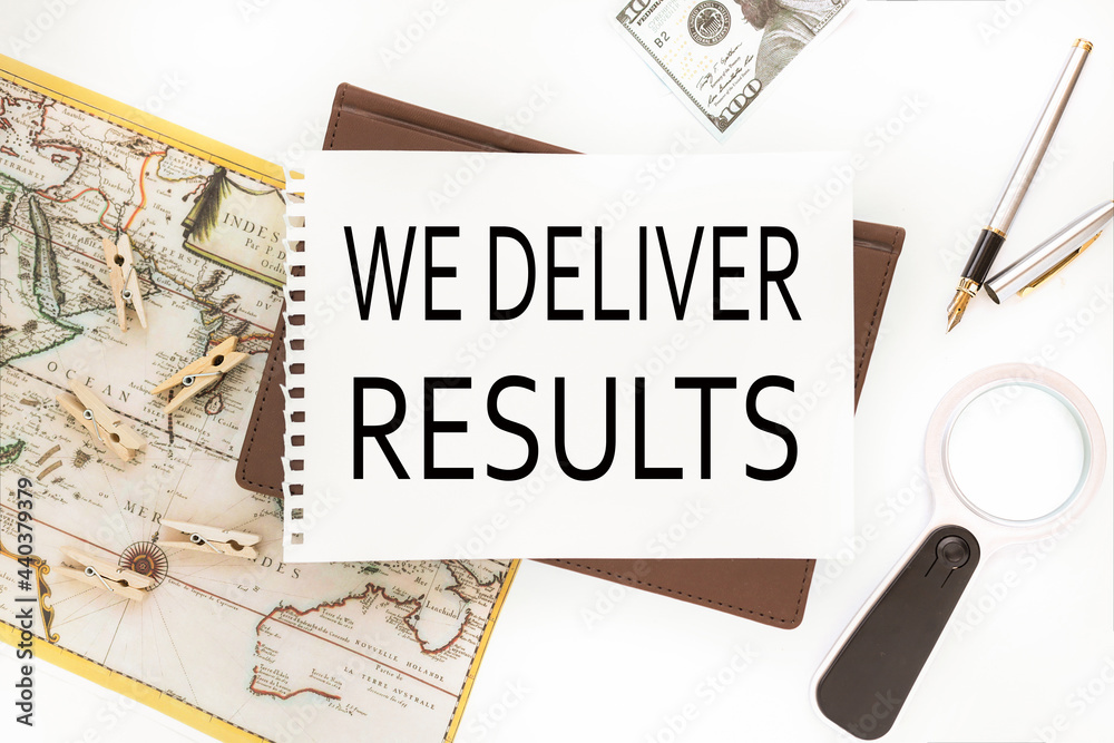 We deliver results ! text on notepad on white background Stock Photo ...