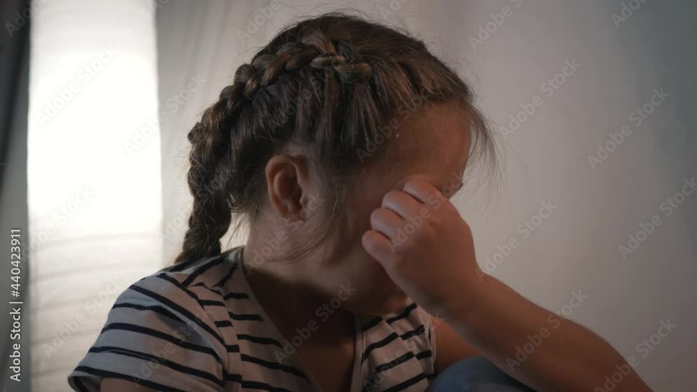 Video Stock Girl is cry in corner. Violence against children in family ...