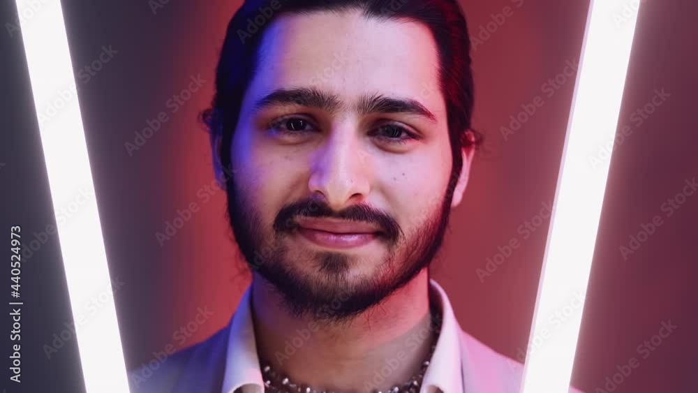 Indian handsome man. Neon light portrait. Futuristic fashion. Model ...