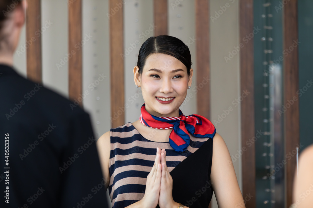 beautiful young asian woman receptionists working at a reception desk ...