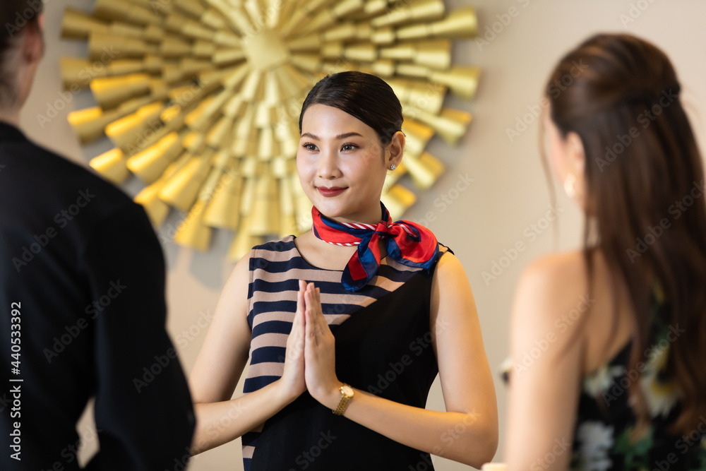 beautiful young asian woman receptionists working at a reception desk ...