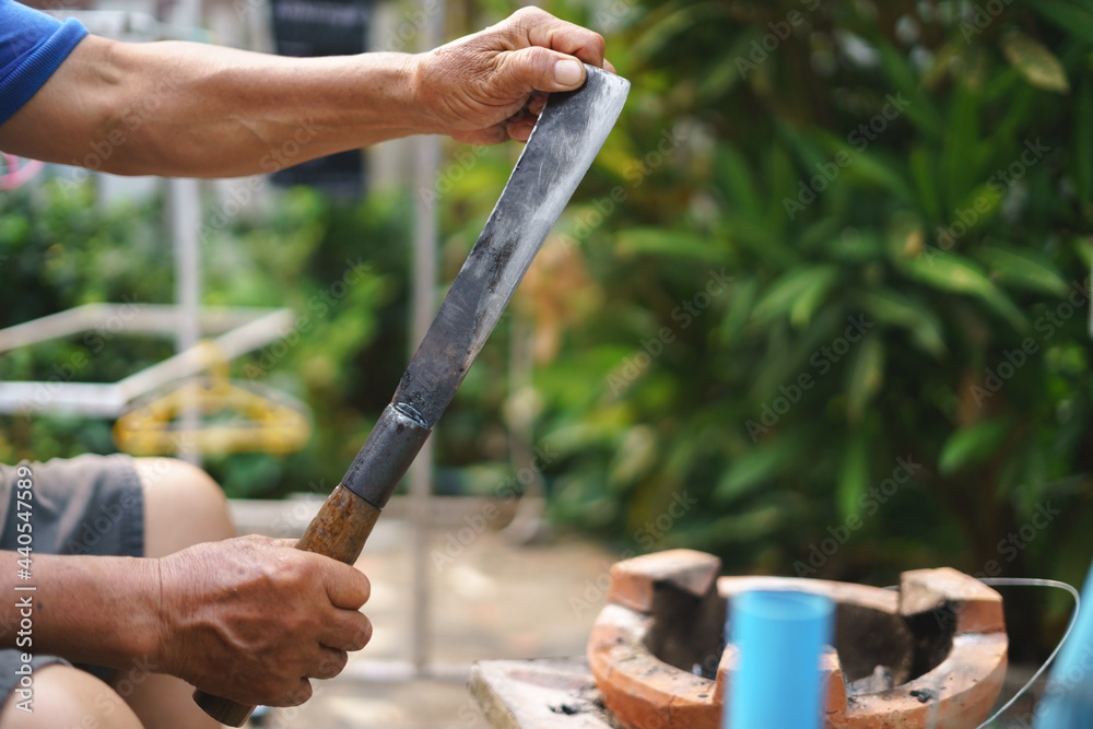 Blade handle fix and repair by Asian traditional method Stock Photo ...
