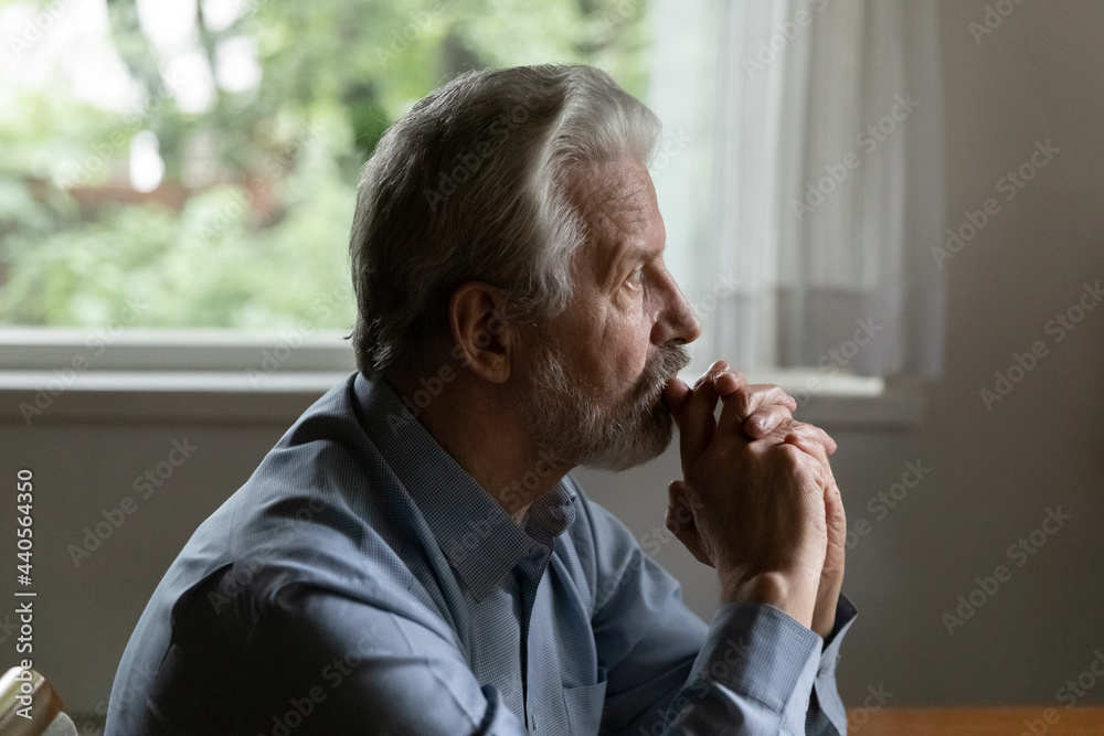 Sad pensive old Caucasian man look in distance thinking pondering of ...