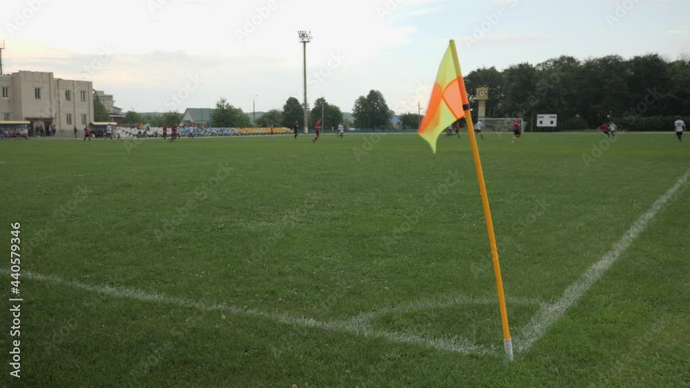 Flag on football pitch corner. Flag waving in corner at stadium soccer ...