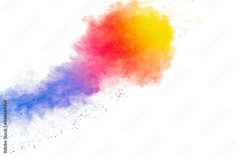 Abstract multi colored powder explosion on white background. Freeze ...