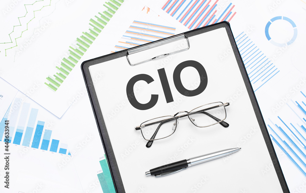 cio sign. Conceptual background with chart ,papers, pen and glasses ...