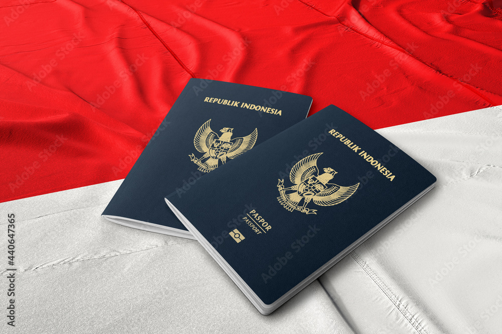 Indonesia passport on the Indonesian flag ,An Indonesian passport is a ...