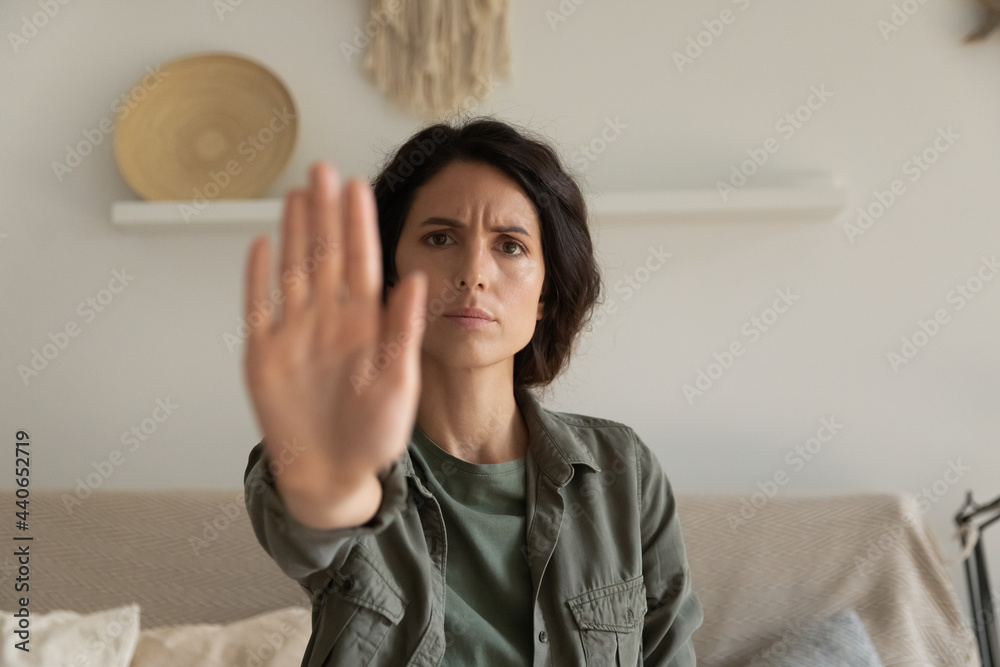 Close up serious confident strong woman showing stop gesture with hand ...