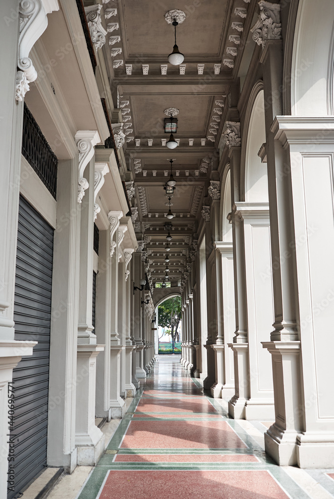 Corridor with pillars on the exterior of a building of classical ...