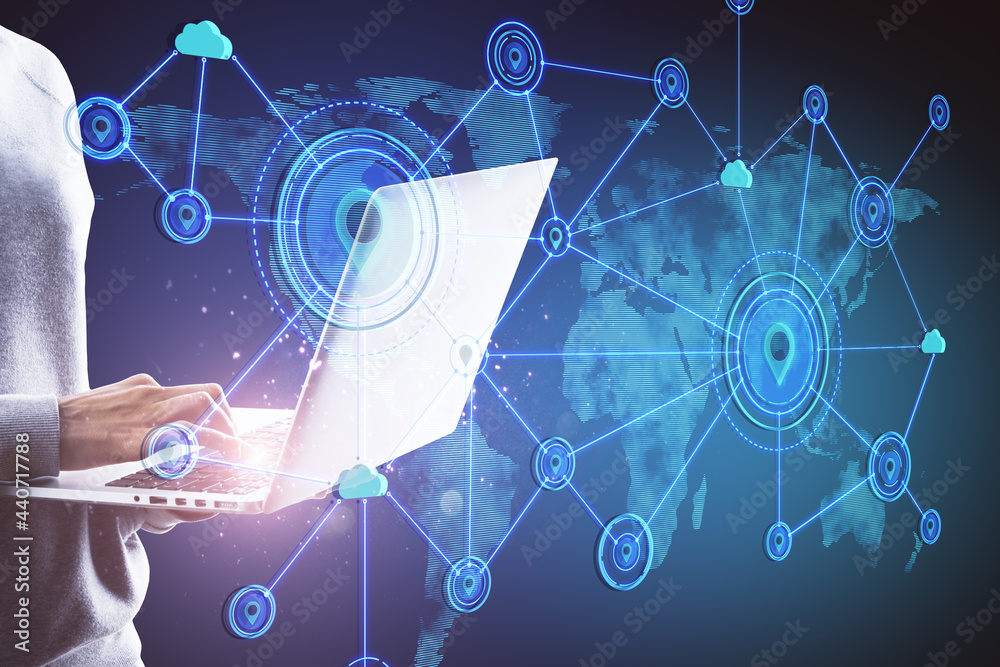 Hand using computer with abstract map and location pins hologram on ...