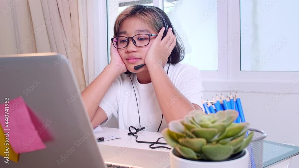 4K Learn from hone concept. Asian girl student learning virtual ...