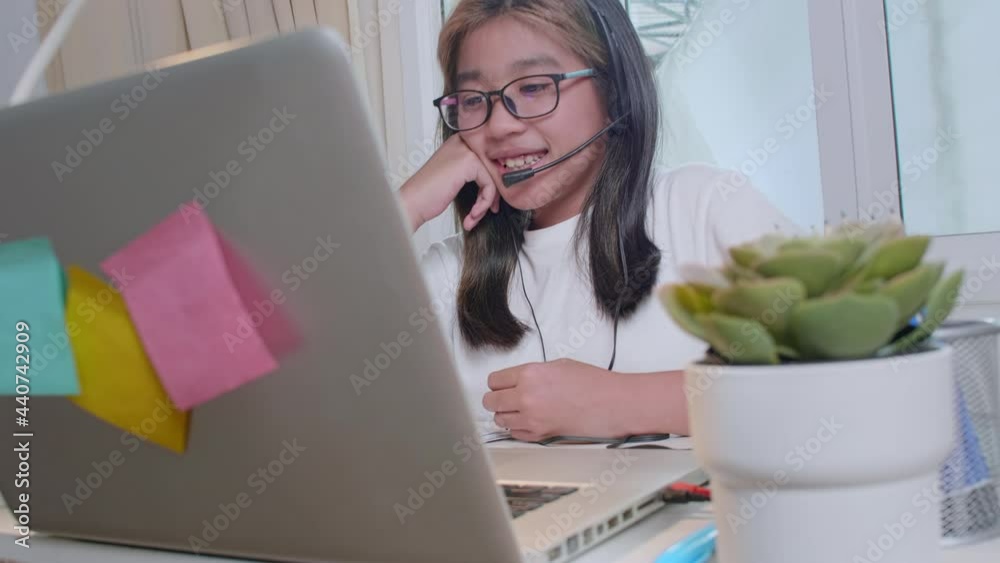 4K Learn from hone concept. Asian girl student learning virtual ...