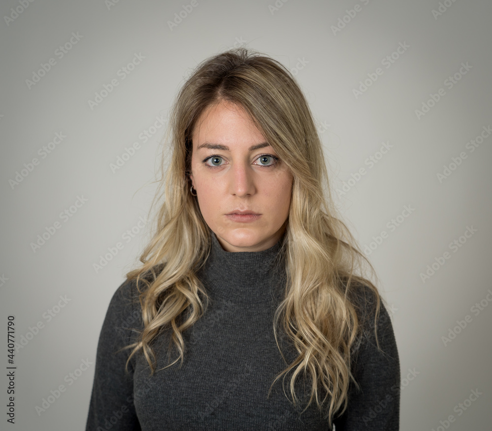 Portrait of young attractive caucasian woman suffering from depression ...