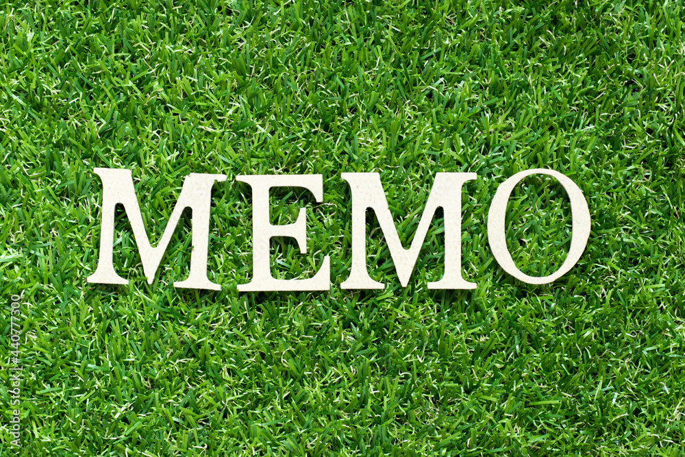 Alphabet letter in word memo on green grass background Stock Photo ...