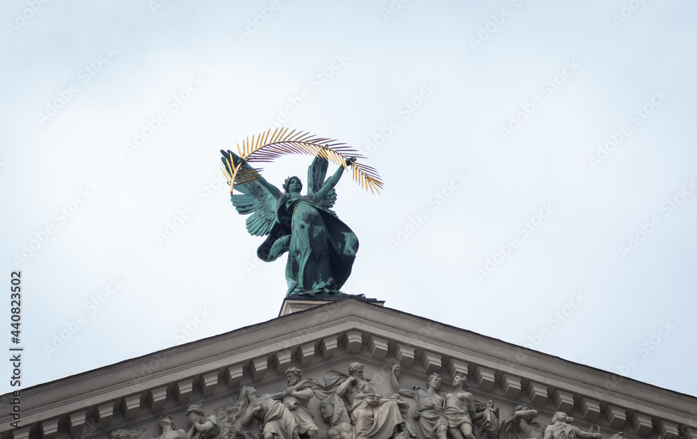 Lviv, Ukraine - 06/14/2021: Statue of Glory with wings on the roof of ...