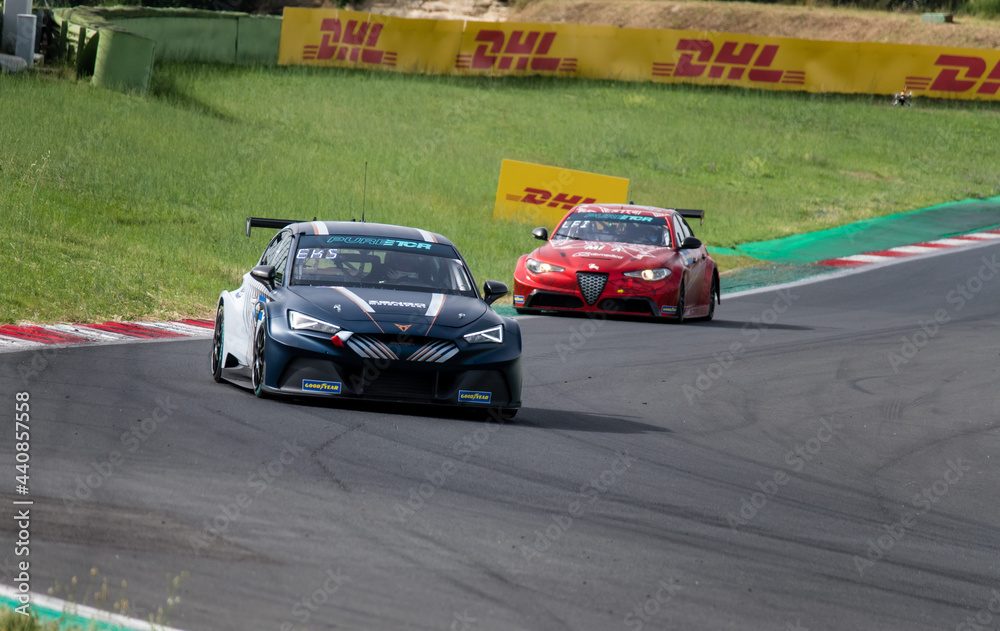 Pure ETCR Championship. Electric cars battle in action racing on ...