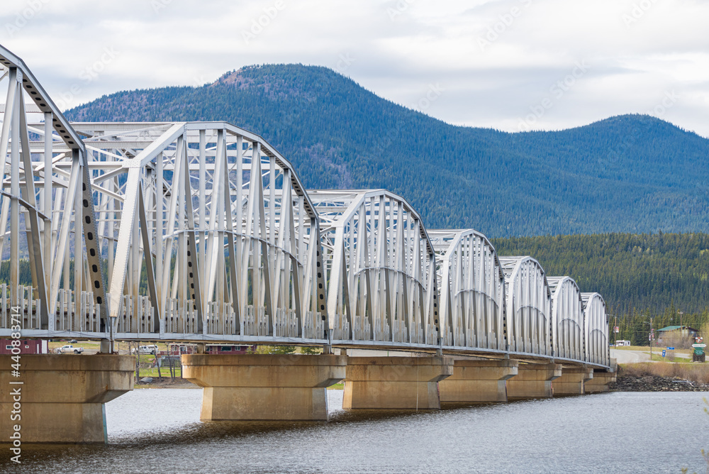 Large man made structure steel bridge spanning across Nisutlin Bay in ...