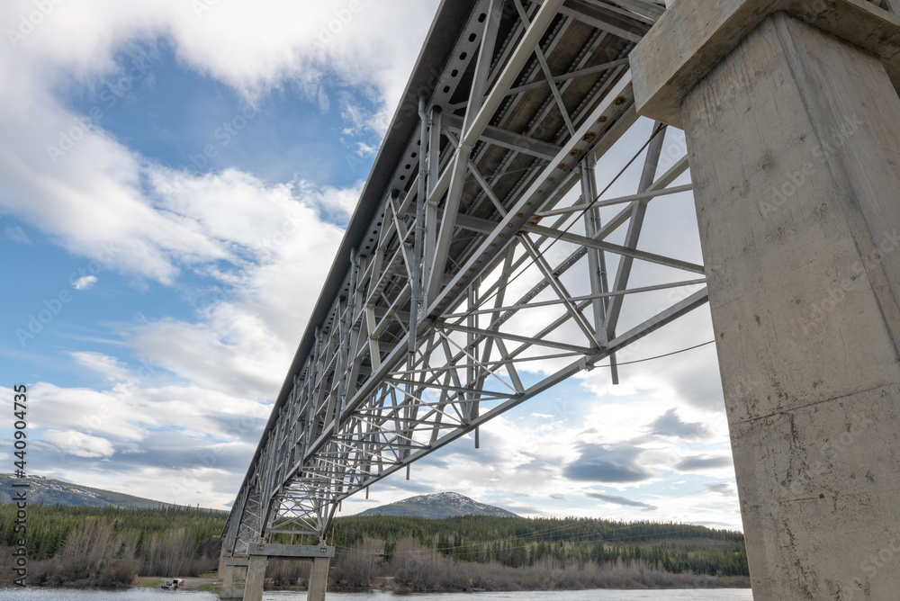 Large steel structure bridge in northern Canada in artistic style with ...