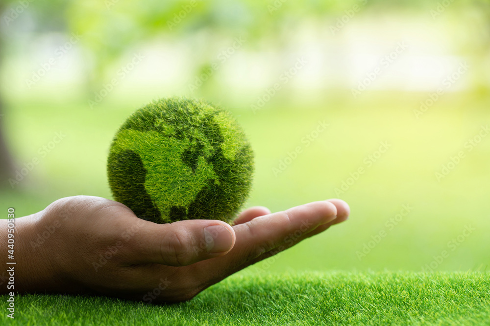 Close up hands holding earth on green background.protect nature.Save ...