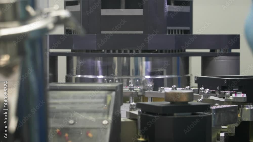 Medical technician checks the production process. Medical encapsulation ...